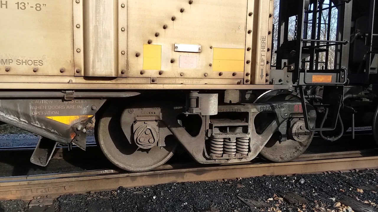 Switching Loaded Coal Hopper Cars from a Siding to Main - YouTube