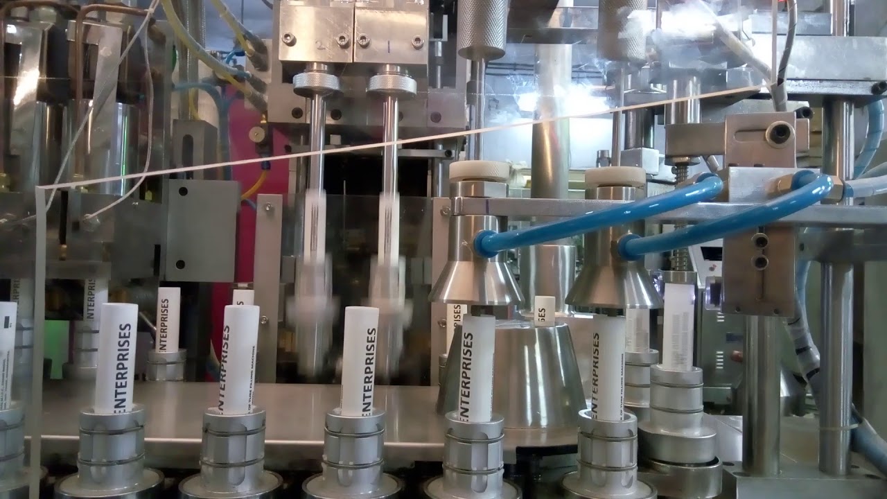 Double Head Tube filling machine with Link up to Caroning - Rahul ...