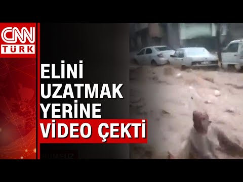 Elini uzatmak yerine video çekmeye devam etti