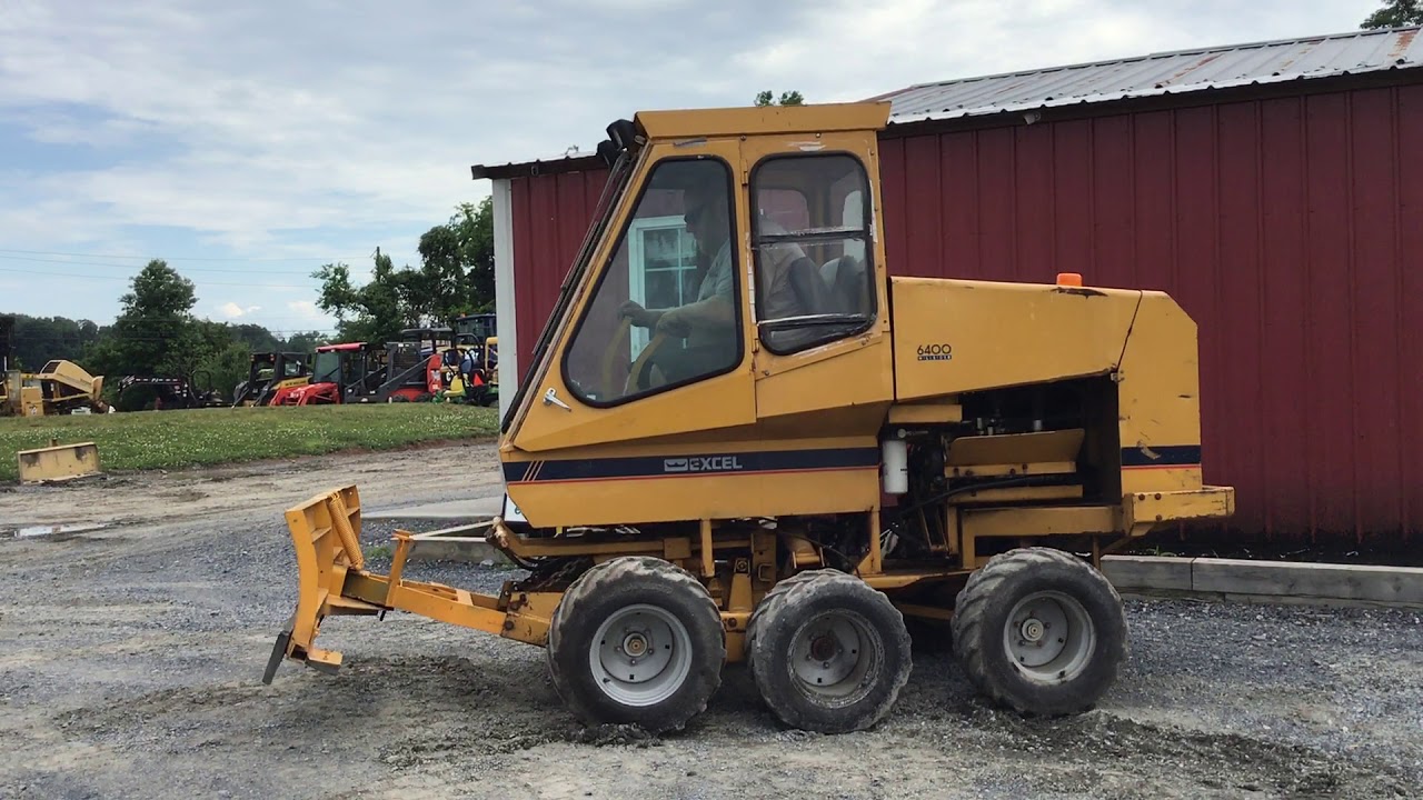 HUSTLER SIDE HILL MOWER - YouTube