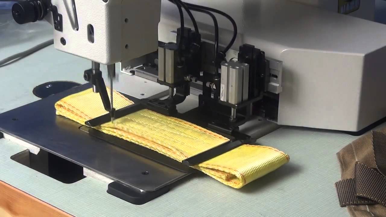 Programmable pattern sewing machine for heavy synthetic webbing slings ...