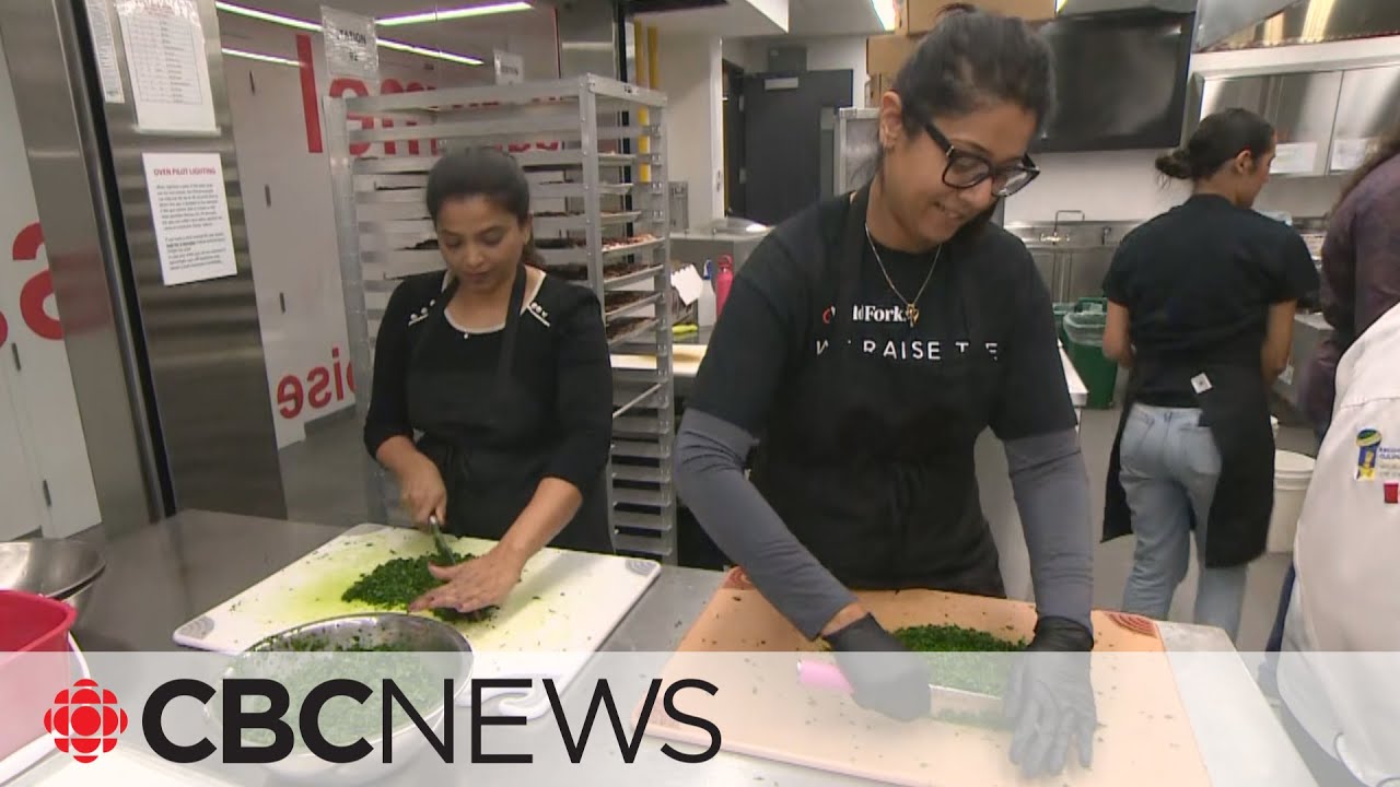 Culinary students make thousands of meals for people in need - YouTube