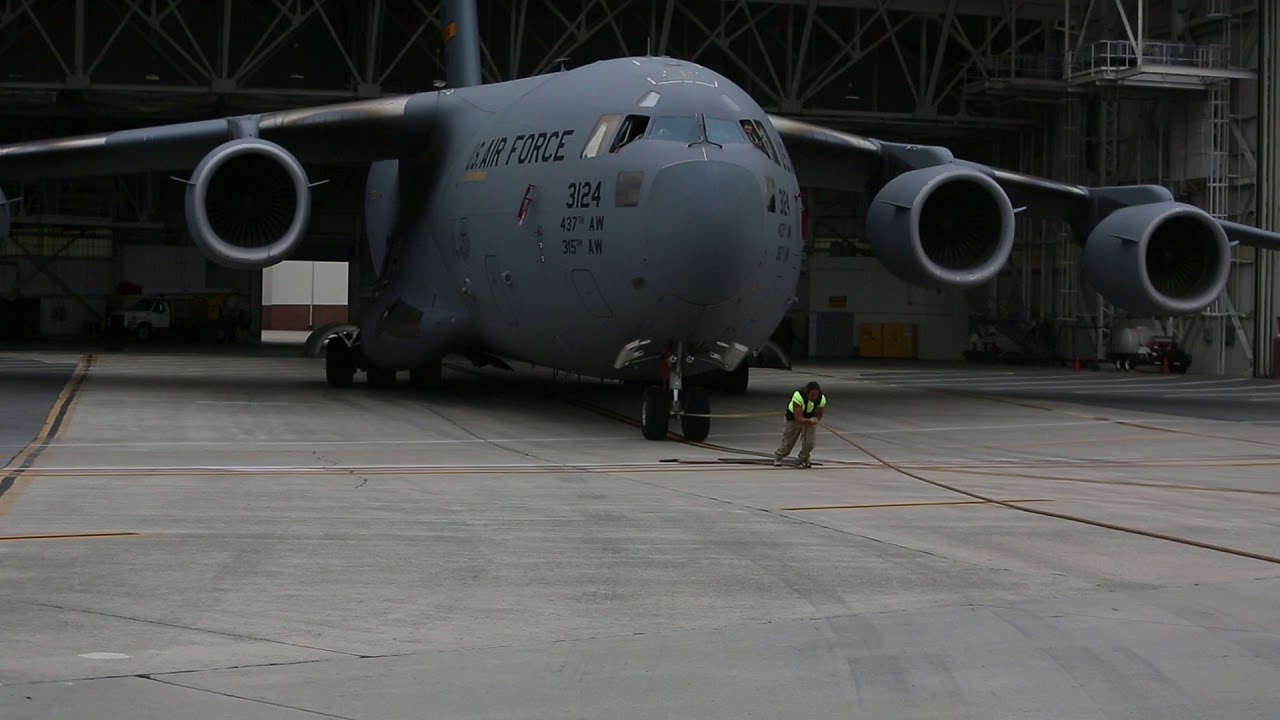 Strongman pulls Air Force C-17 at Charleston base - YouTube