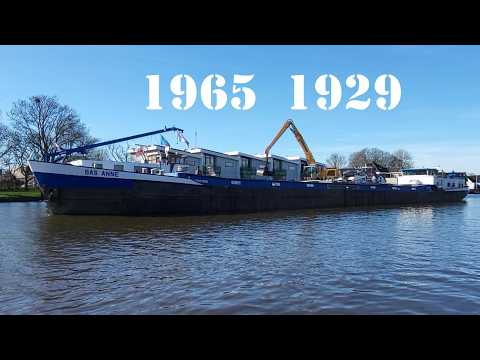 Old Dutch ships and barges are still in operation. Bas Anne 1965. CORMA 1929. Sky Air Clouds Sun.