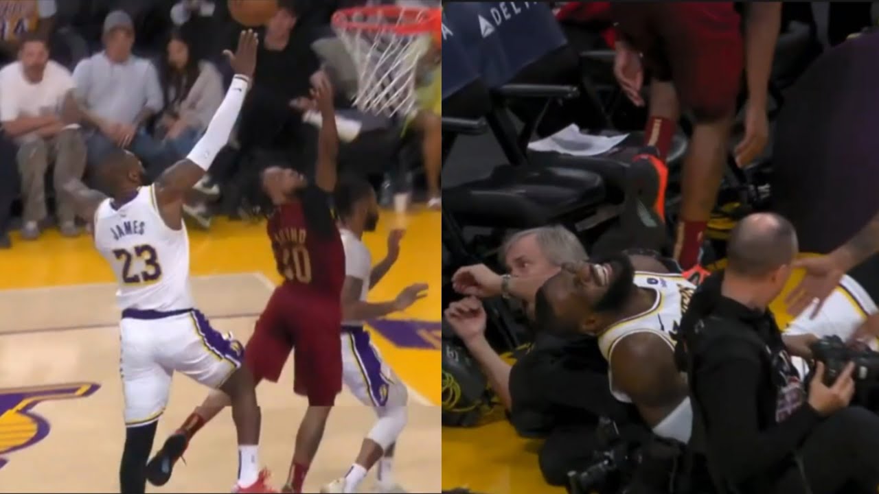 LeBron James collides with a cameraman following a fierce chase-down ...