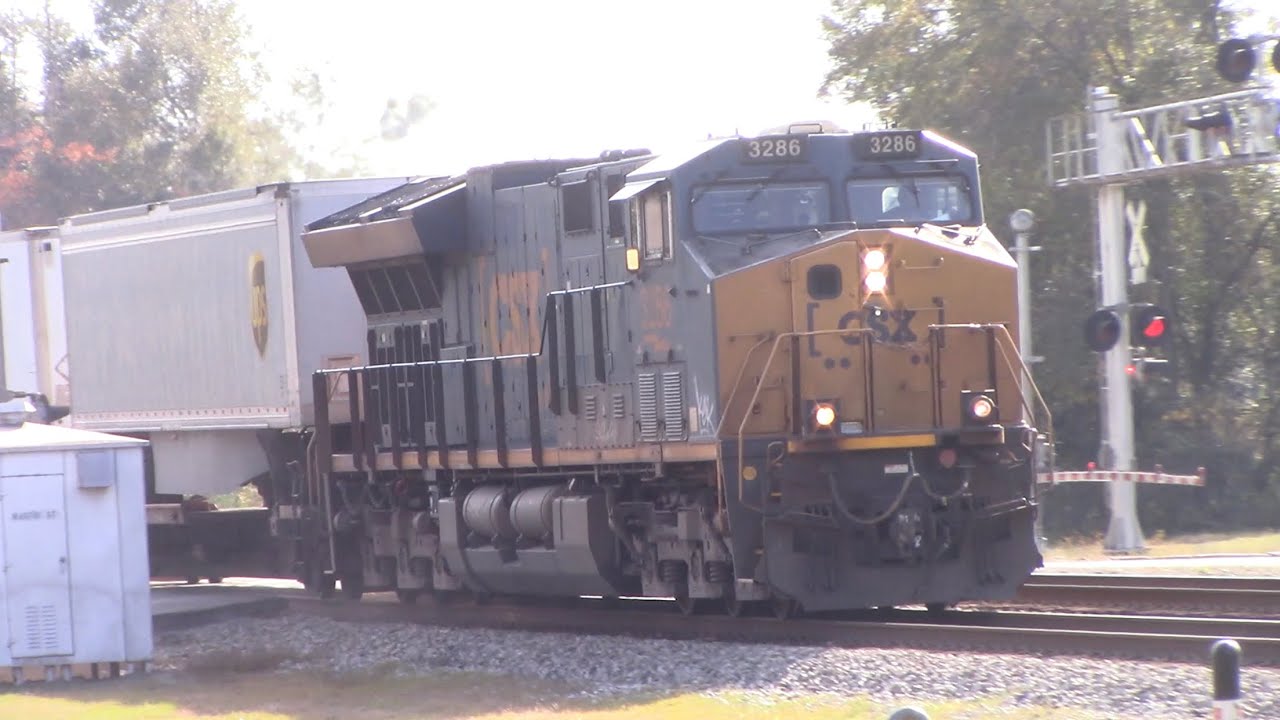 CSX 3286 leading CSX I034-03 with a hornshow flys by Folkston, GA 12/3 ...