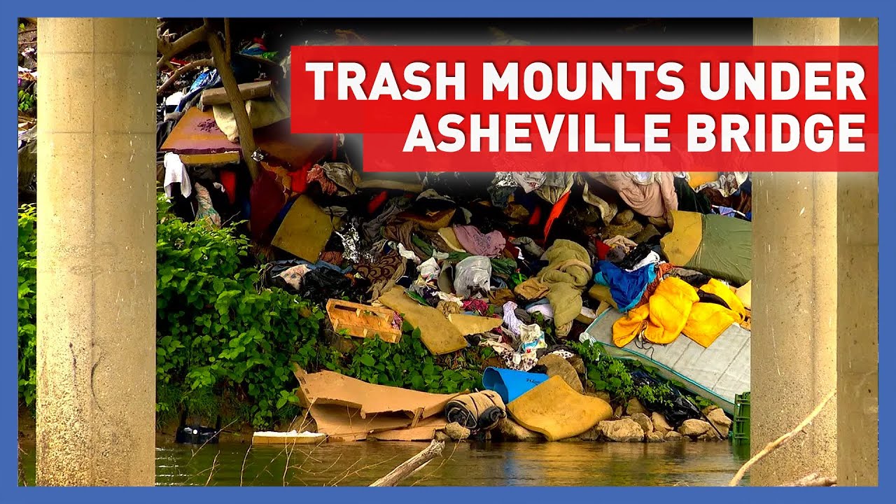 Concerns mount over trash piled under Asheville bridge - YouTube