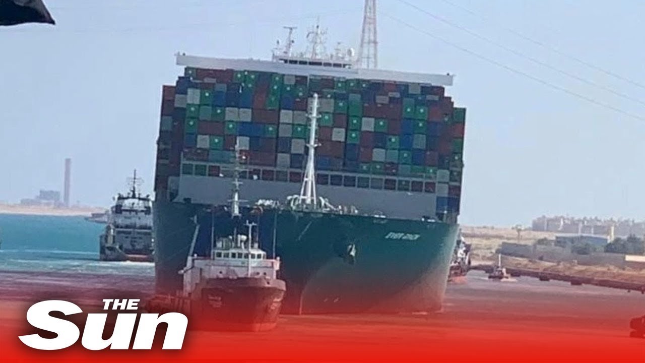 Grounded ‘mega ship’ BLOCKS Suez Canal causing huge traffic jam - YouTube
