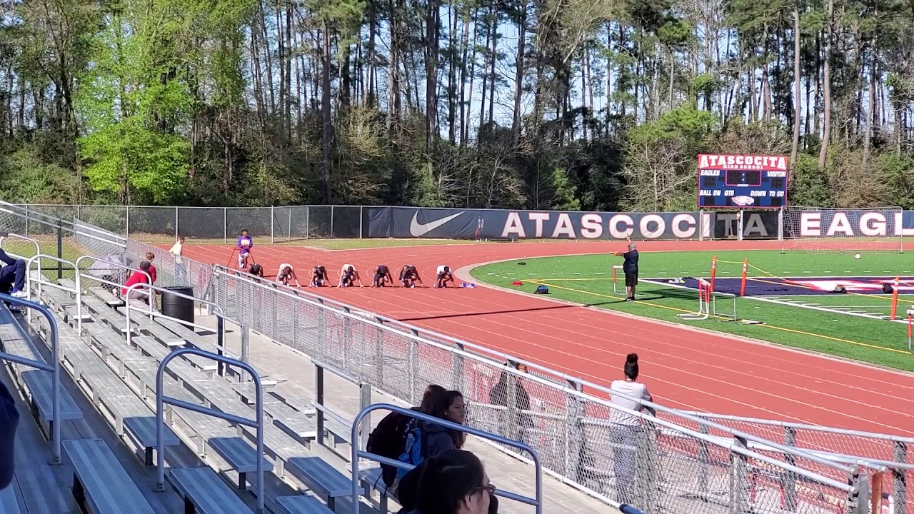 1st Varsity Track meet 100m as a freshman - YouTube