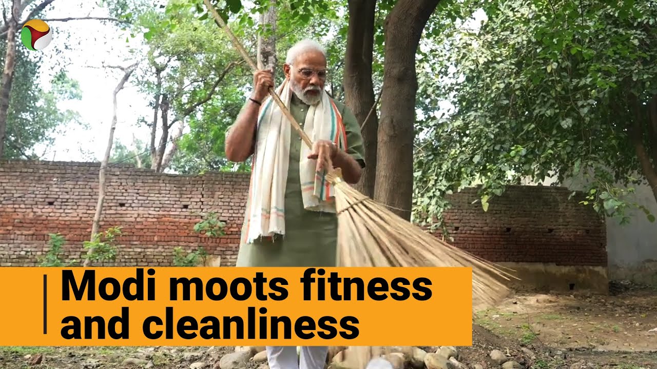 Modi leads fitness drive, broom in hand - YouTube
