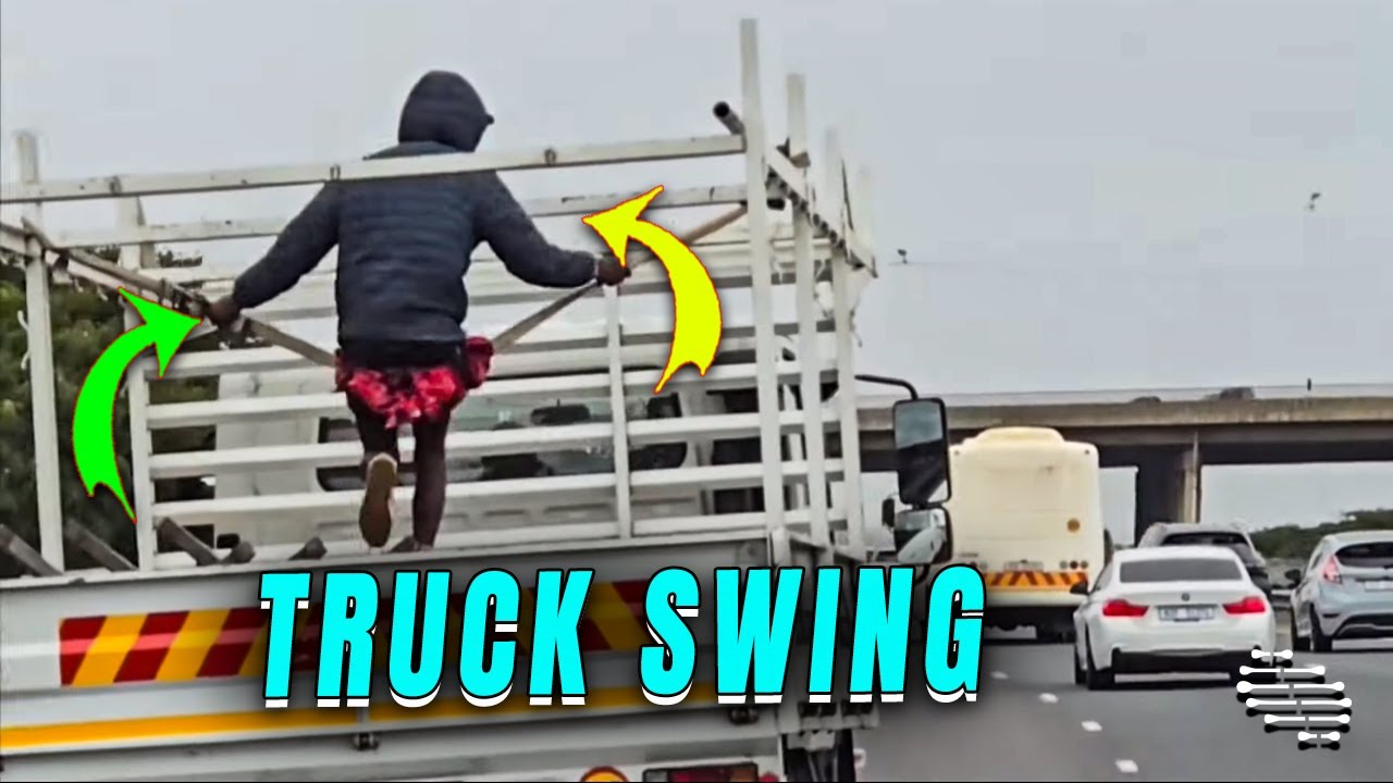Man Swinging on the Back of a Moving Truck - YouTube