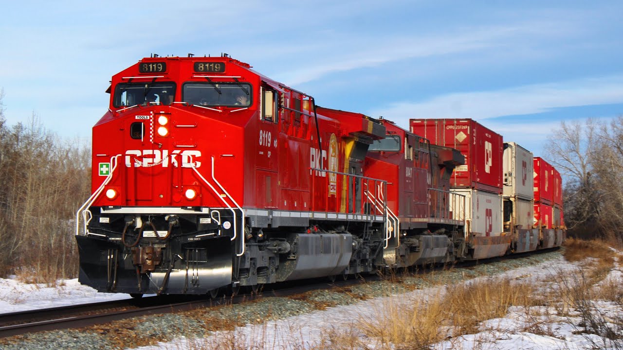 SUPER RARE! CPKC new paint AC44CWM leader! CP 8119 leads CP Srack train Eastbound at Edworthy ...