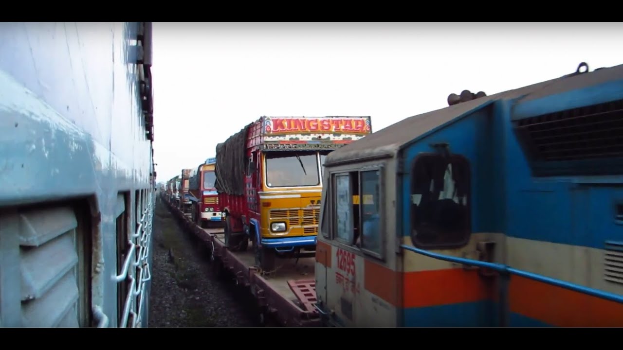 Overtaking a RoRO rake and pulling into Madgaon yard! - YouTube