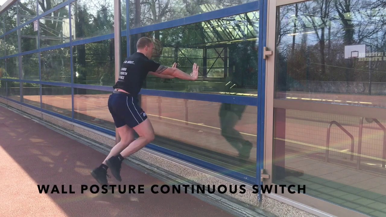 Wall Posture Continuous Switch - Upside Strength Exercise Library - YouTube