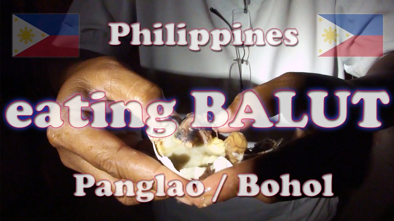 eating BALUT on Alona Beach - see how to eat a balut on Alona Beach in ...