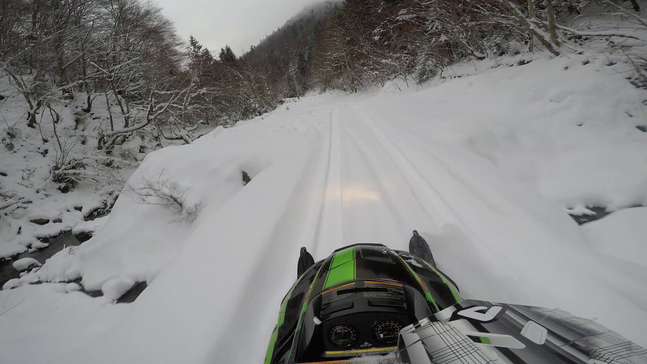 Arctic Cat slade on deep snow - YouTube