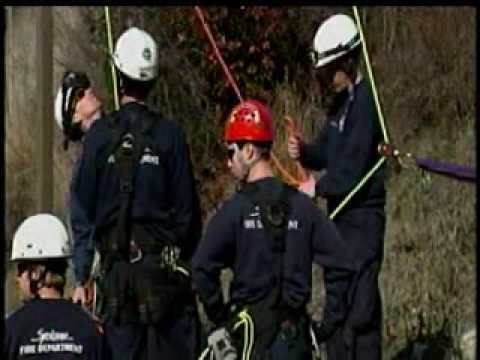 Firefighters using gondolas for high angle rescue practice - YouTube