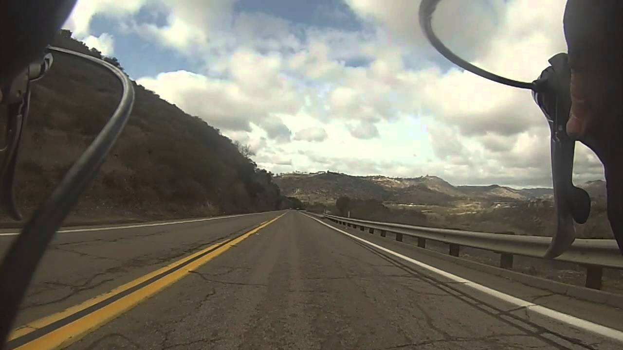 Old 395 descent into a headwind. White nuckler on a tandem. - YouTube