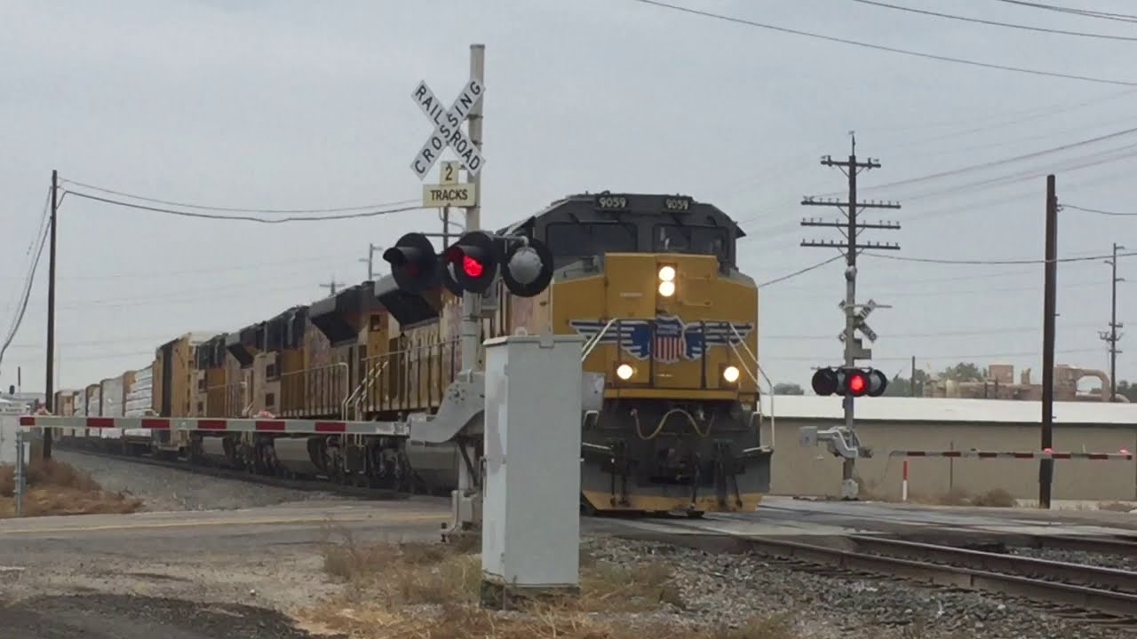 UP Freight Train At Midland Crossing - YouTube