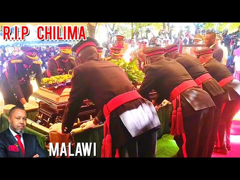 Malawi: Saulos Chilima's coffin being lowered into the grave, during ...