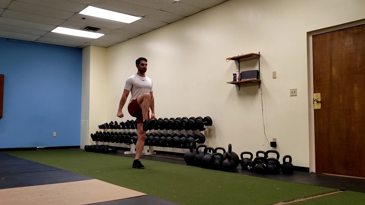 Walking knee hug with hip flexion hold - YouTube
