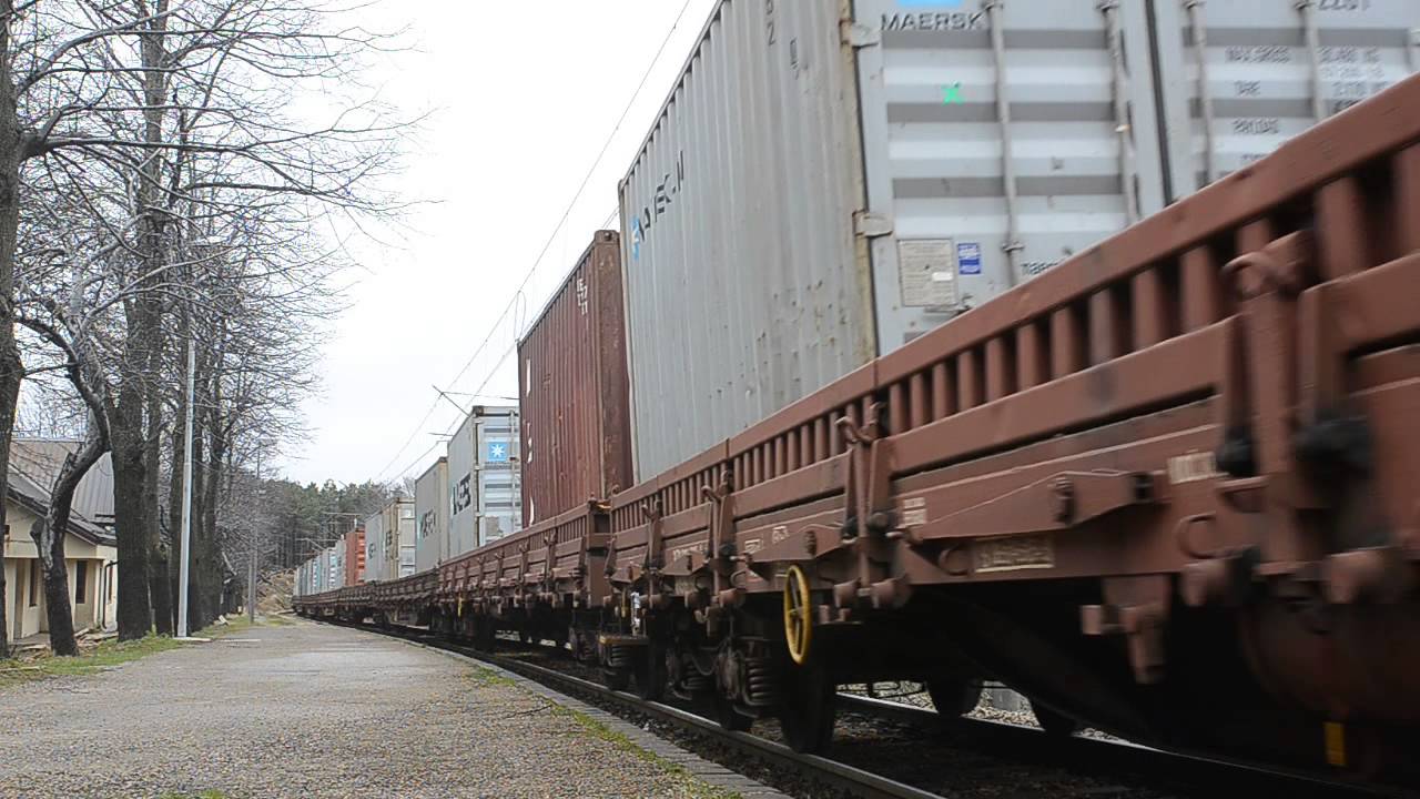 Freight train stops in front of railroad crossing in Zlobin - YouTube