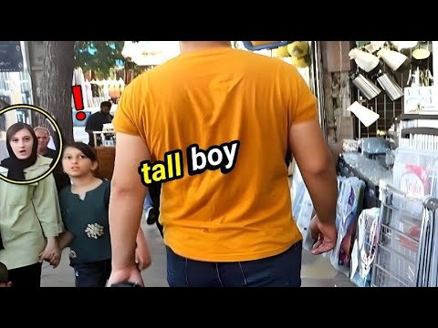 People's reaction to the tall boy in the street | Walking among people ...