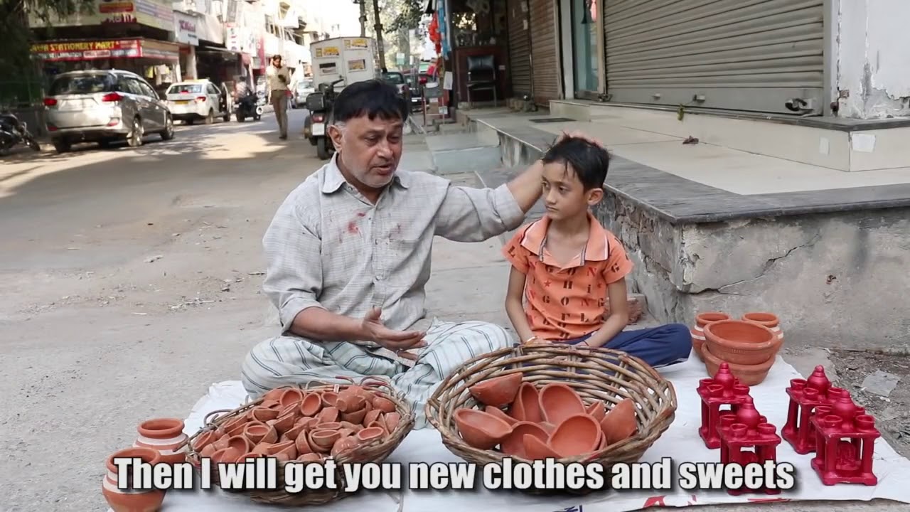 A poor family father and son were selling Diyas on Diwali - YouTube