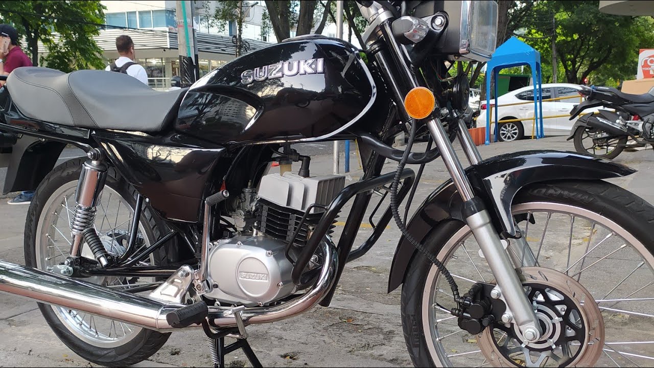 Suzuki ax100, la sencillez de las 2tiempos - YouTube