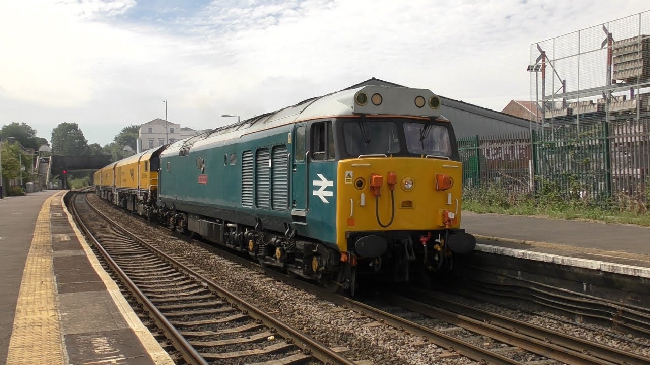 BR 50008 "Thunderer" powers up through Lawrence Hill hauling a rail ...