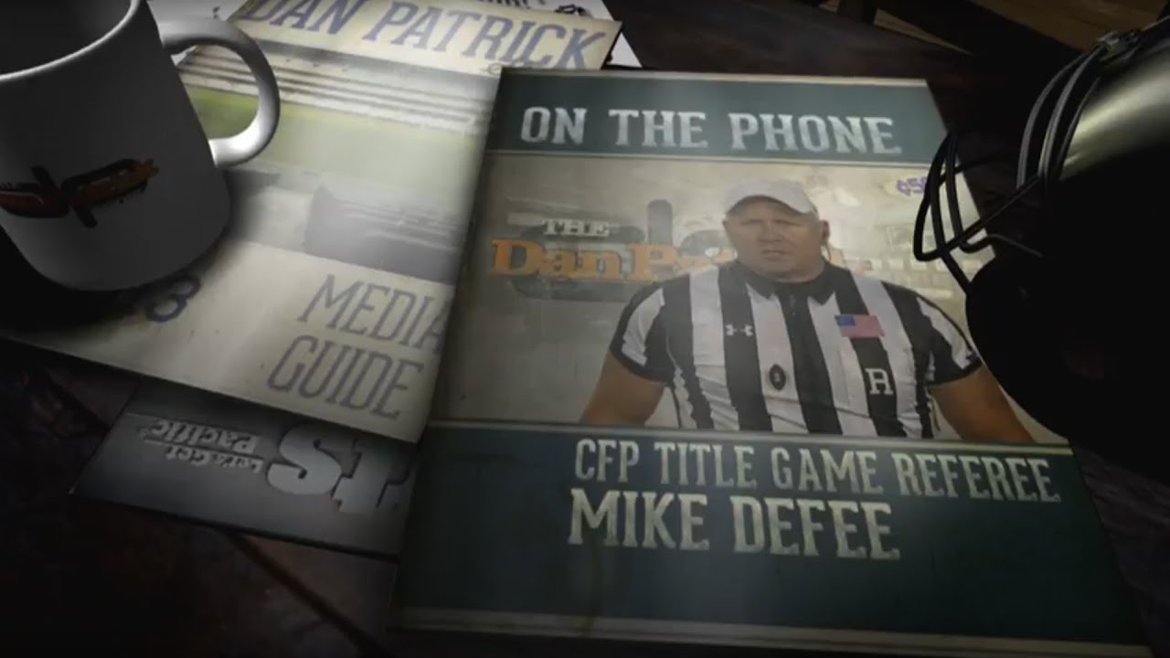 Is National Championship Game Referee Mike Defee always flexing? - YouTube