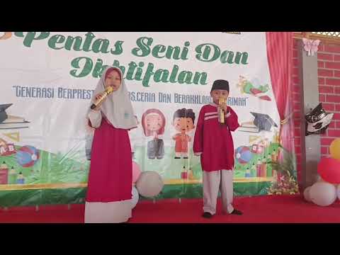 .. abg dan Vira membacakan Syahril Qur'an ..