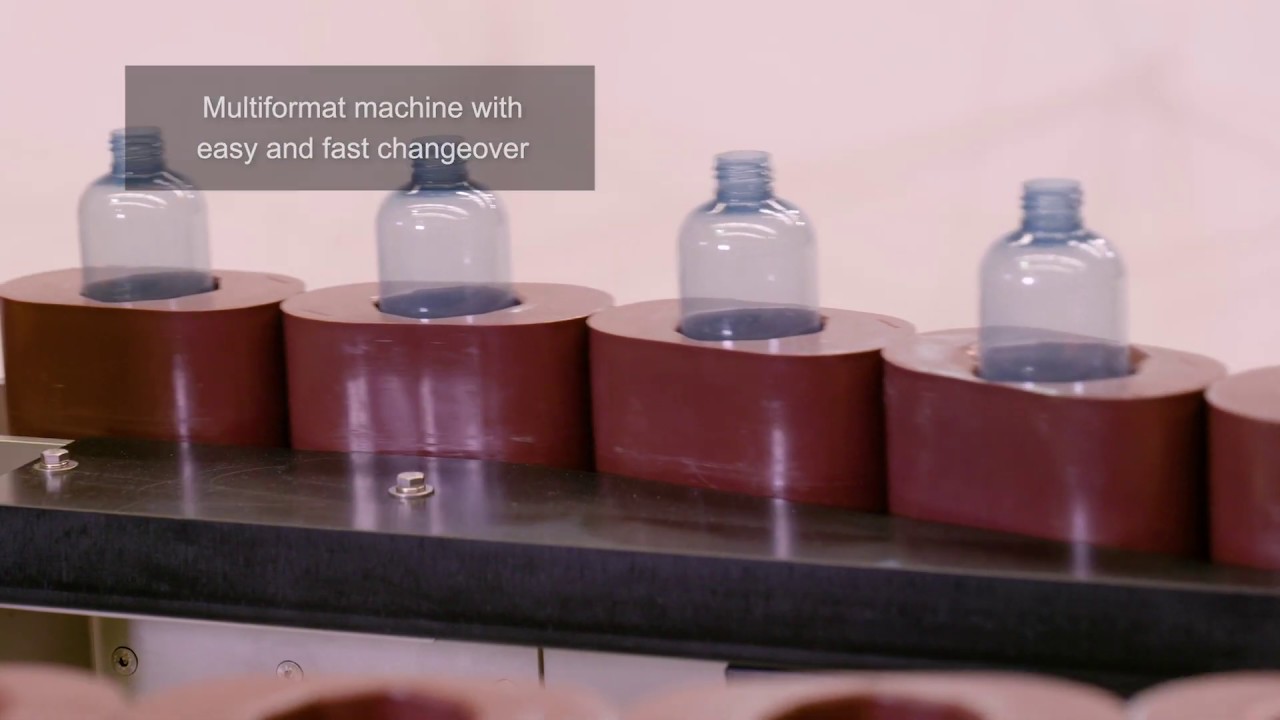 Unscrambler with bottle orienter and puck system - MINOR 100 - YouTube