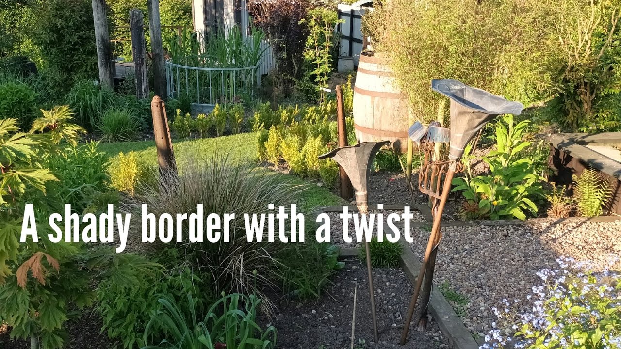 A shady garden border with a twist and another feature is in its place ...