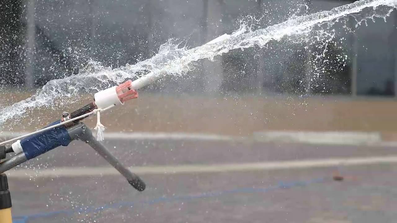 2 liter water bottle launch in slow motion - YouTube