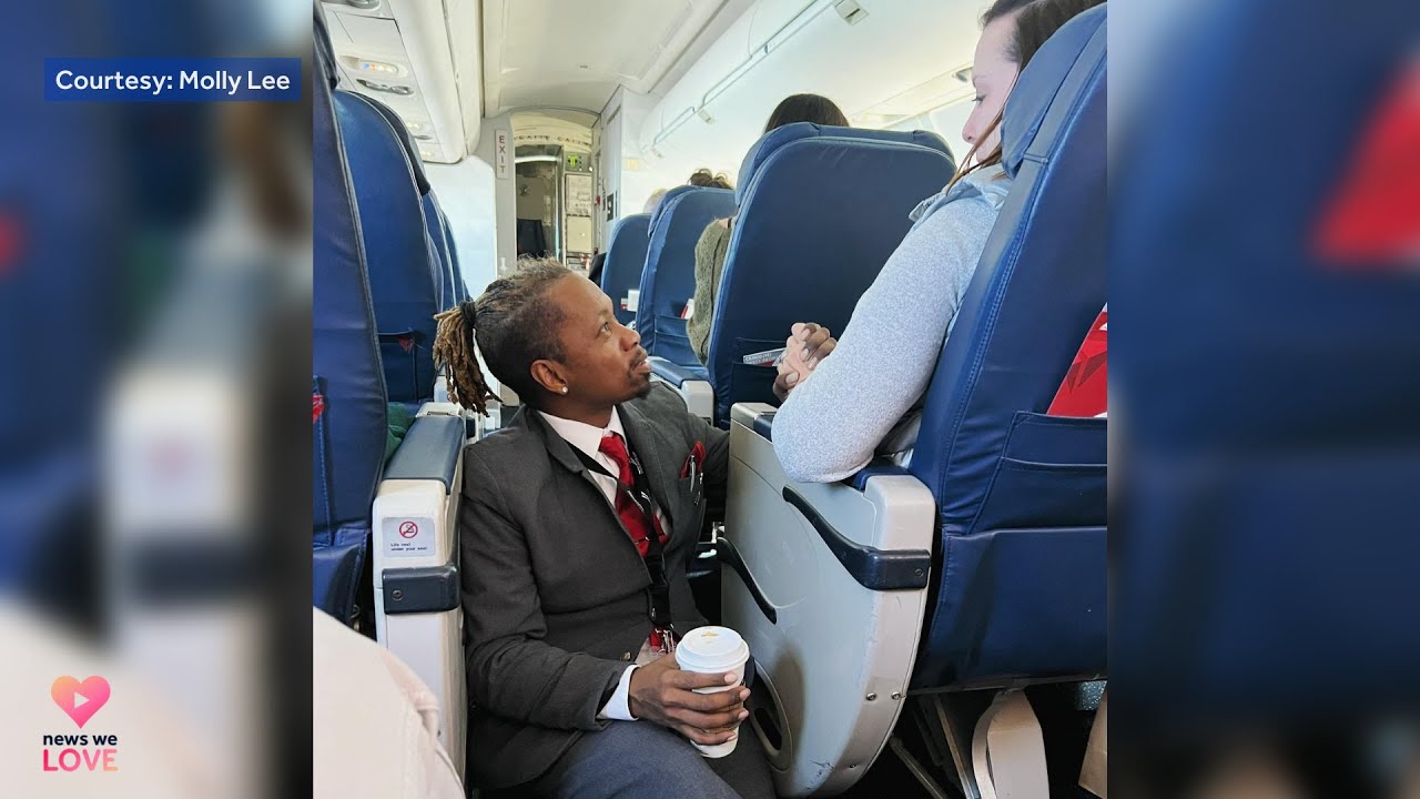 Captivating photo shows a flight attendant comforting a nervous ...
