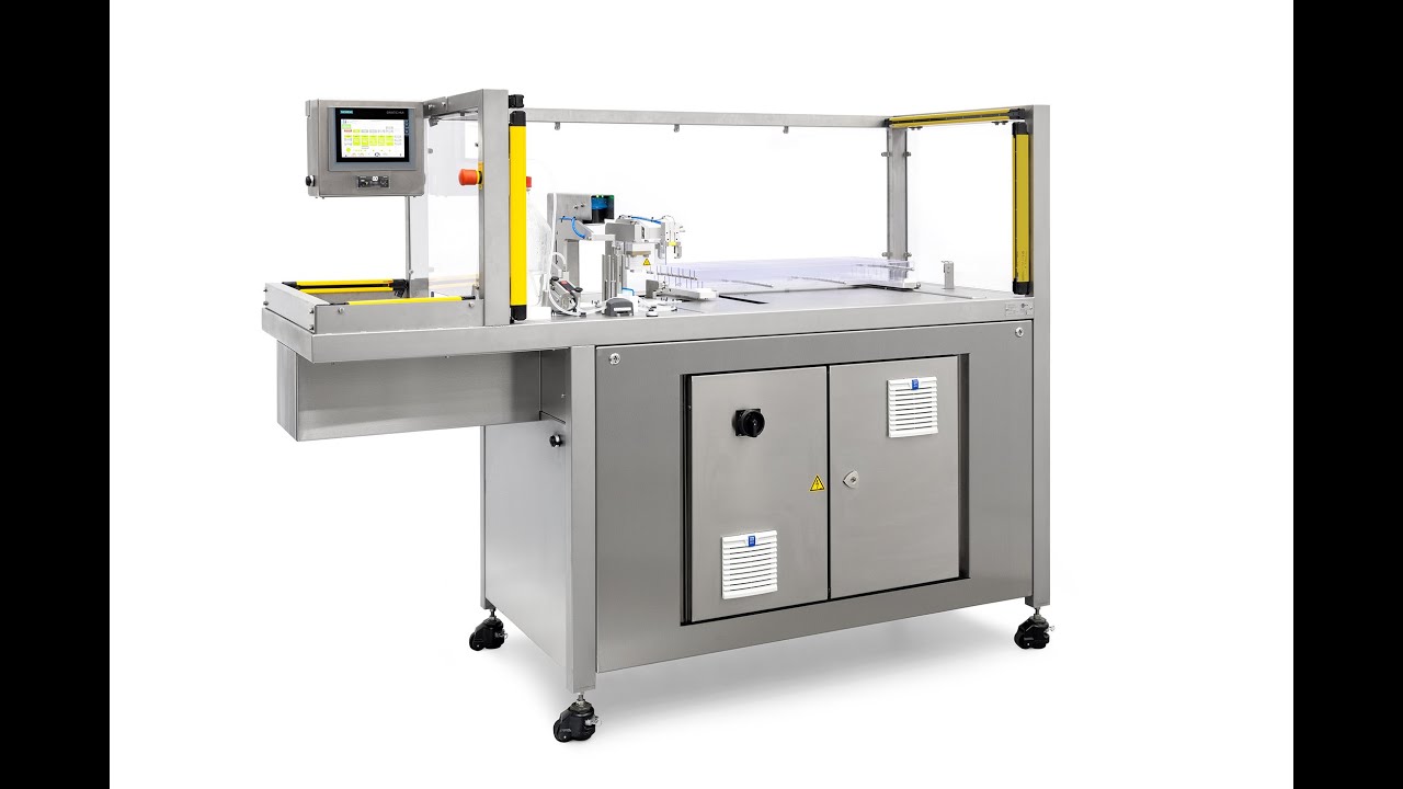 Intraocular lens packing machine - YouTube