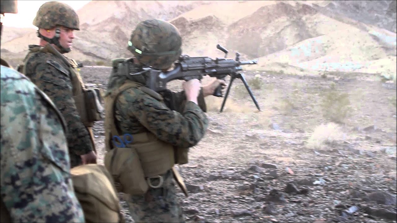 Firing the M-249 SAW Standing - YouTube