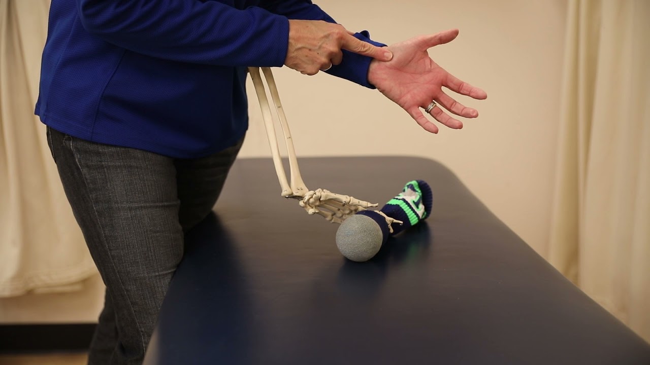 hand self mobilization with tennis balls - YouTube