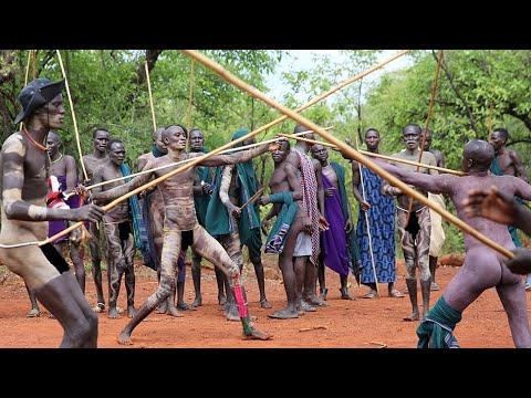 Surma/Suri tribe Donga stick fighting Omo Valley Ethiopia - YouTube