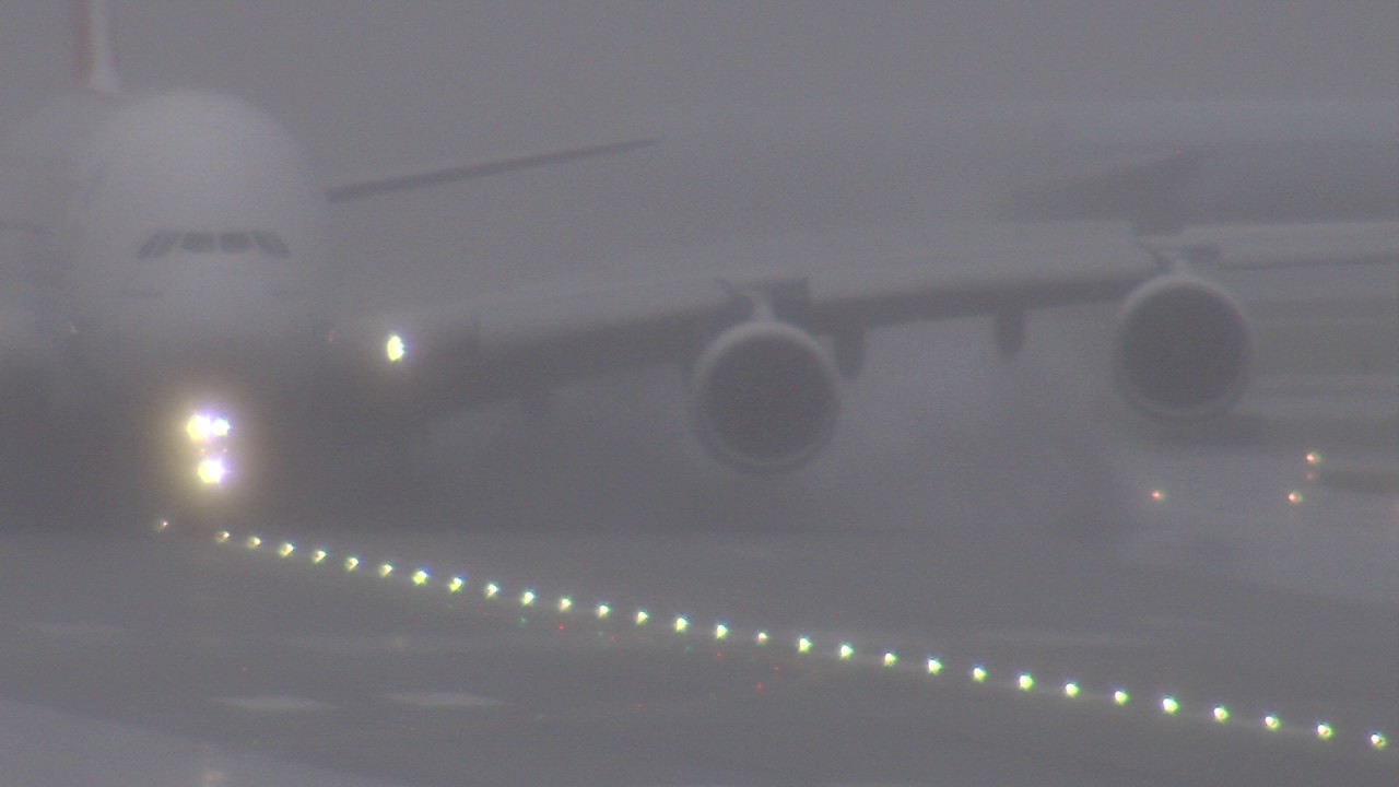 Emirates A380 Landing SFO in Bad Weather - YouTube