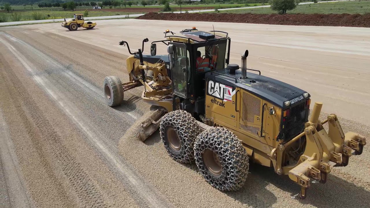 Caterpillar 14M Motor Grader Laying Some Material - Diastasi Ateve ...
