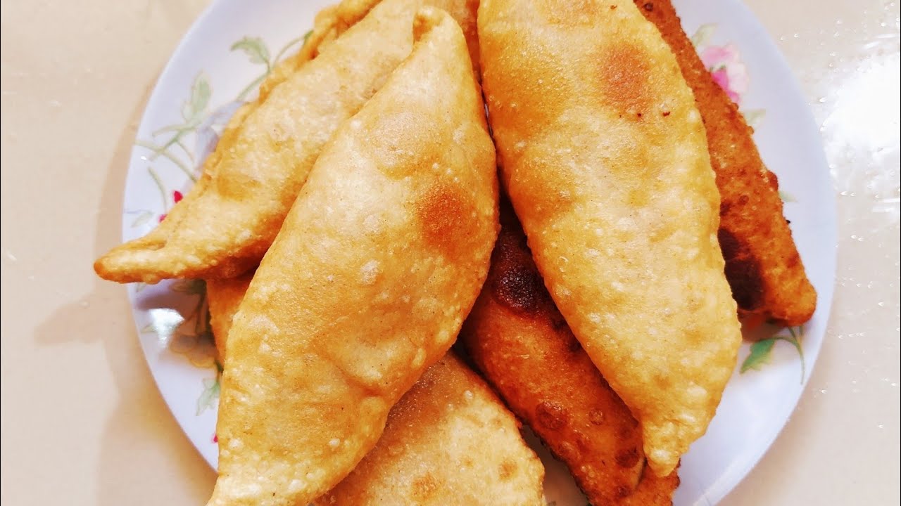 Atta kakara Pitha ll kakara Pitha recipe ll coconut stuffed wheat Flour ...
