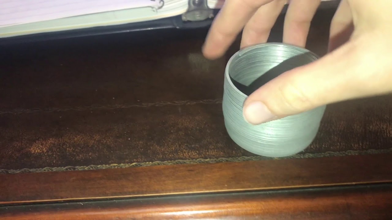 How to play with a slinky pt. 2 - YouTube