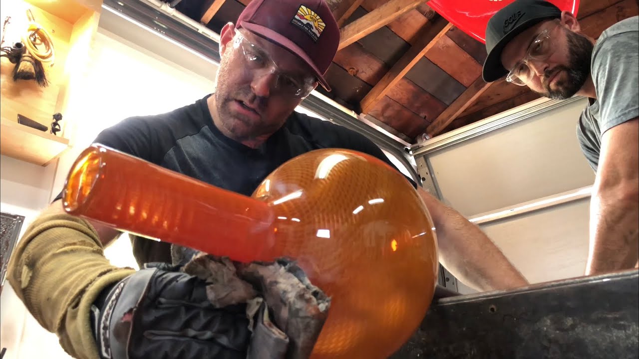 Glass artist Jason Christian creates a citrus green reticello footed ...