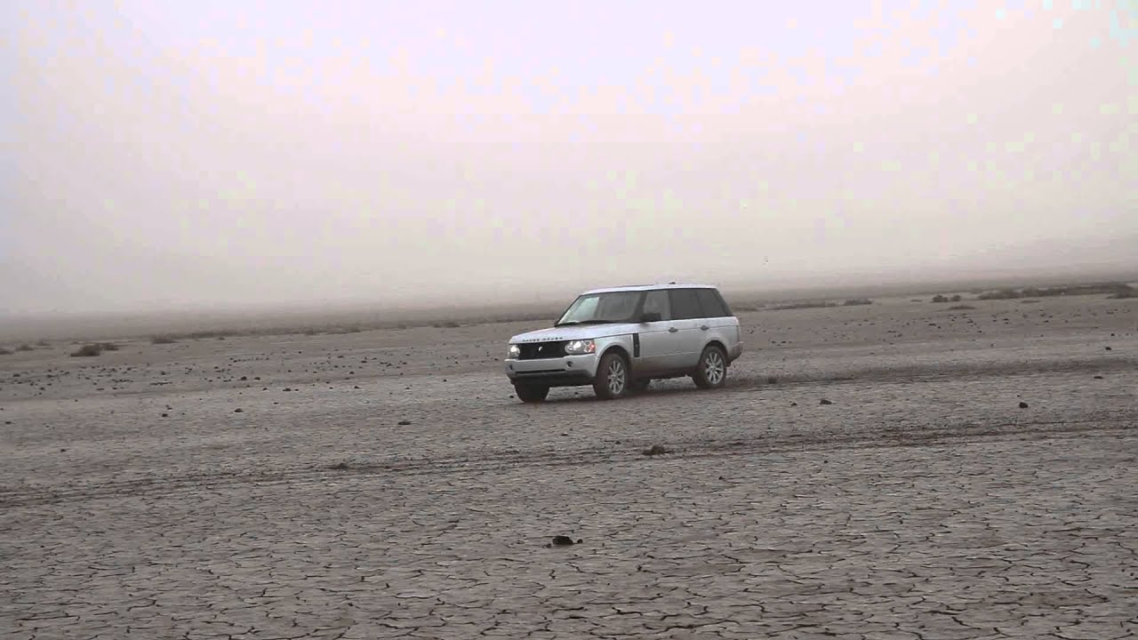 Range Rover Supercharged drifting on a dried up lake bed - YouTube