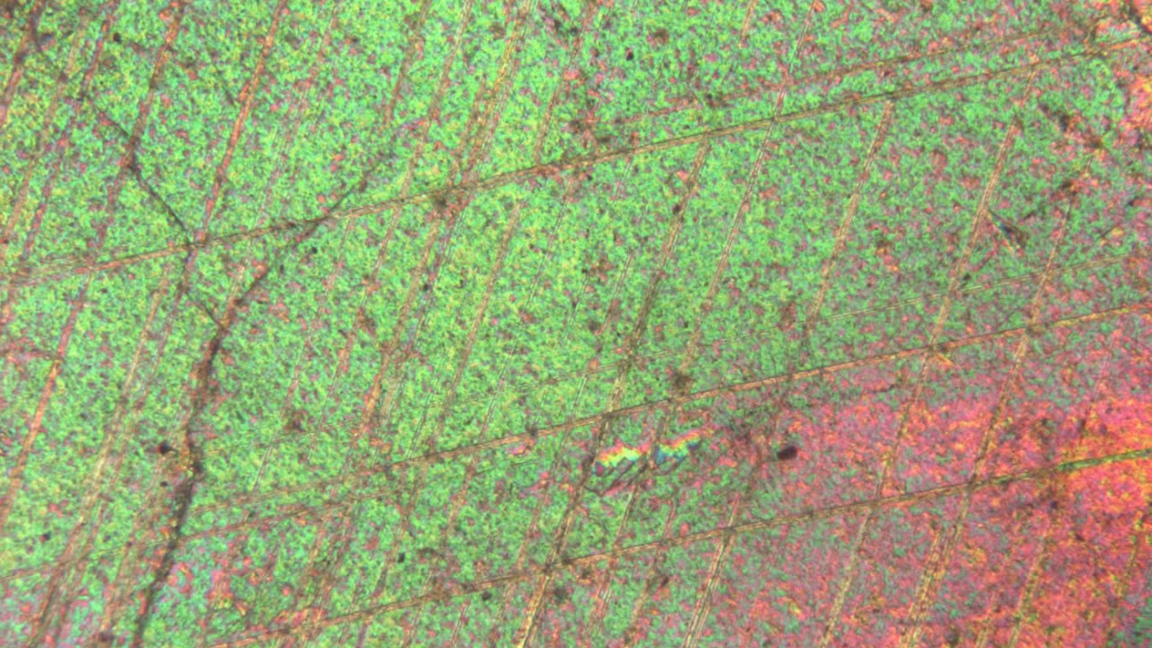 Calcite au microscope polarisant (LPA) - YouTube