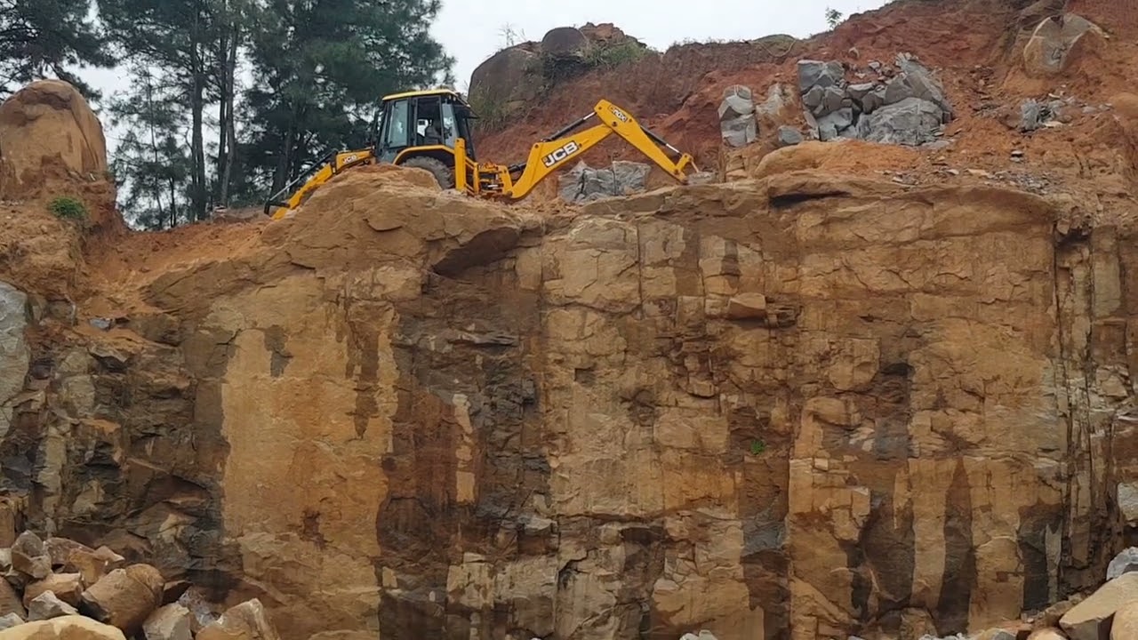 jcb working in a stone quarry - YouTube
