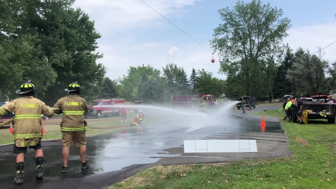 Watch Now: Fire departments compete in push ball at Party in the Park ...