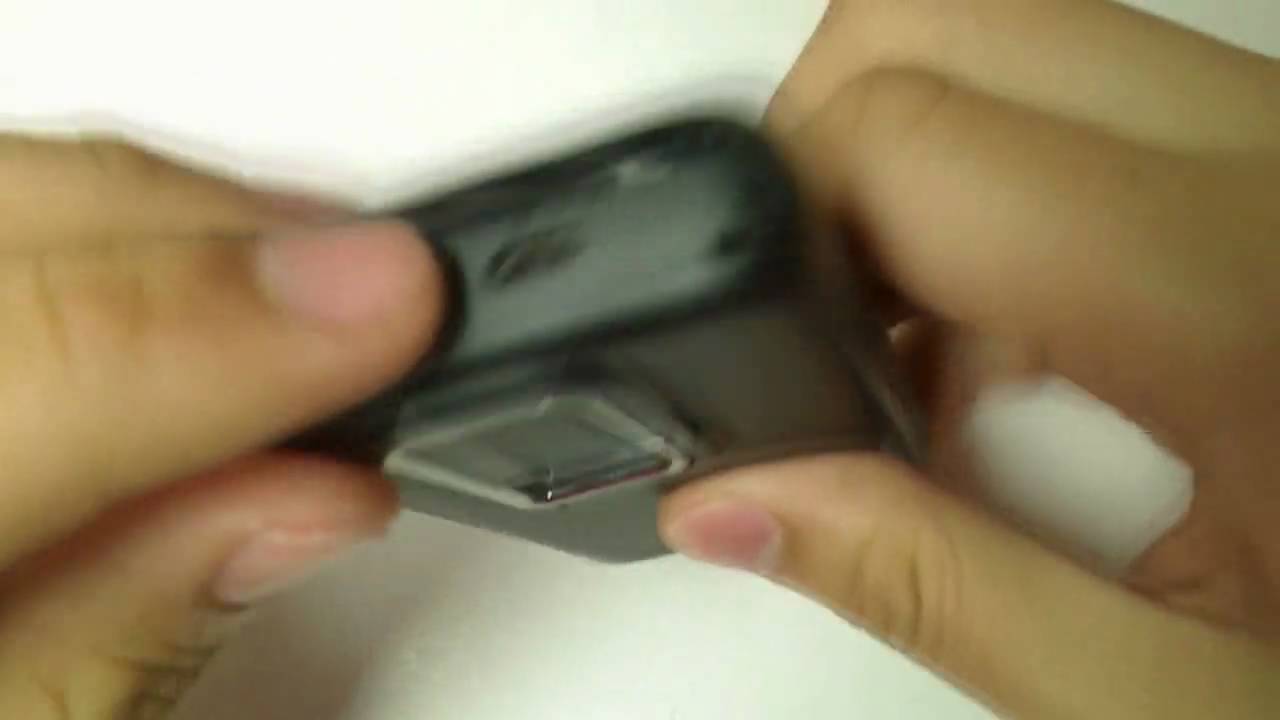How to remove back cover of the Nokia N900 and how to insert wrist ...